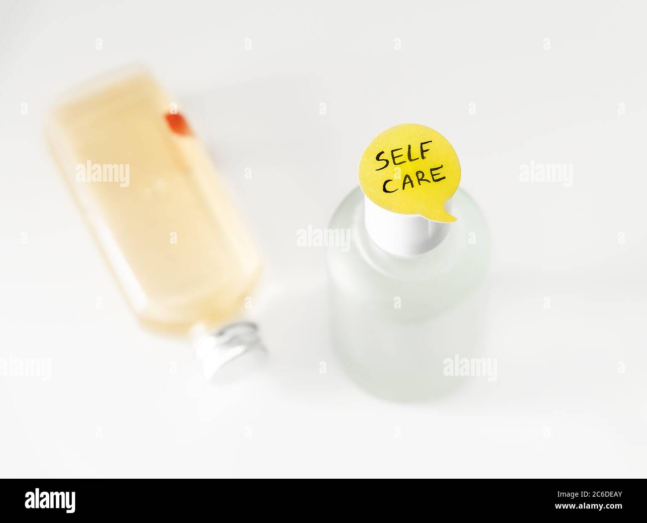 Cosmetics tubes with sticker "Self care Stock Photo - Alamy