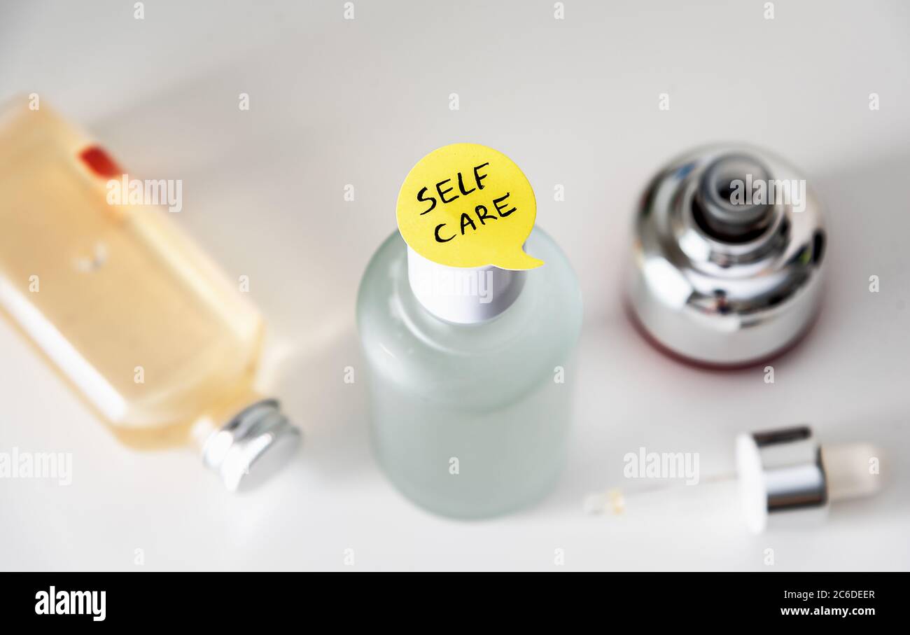 Cosmetics tubes with sticker "Self care Stock Photo - Alamy
