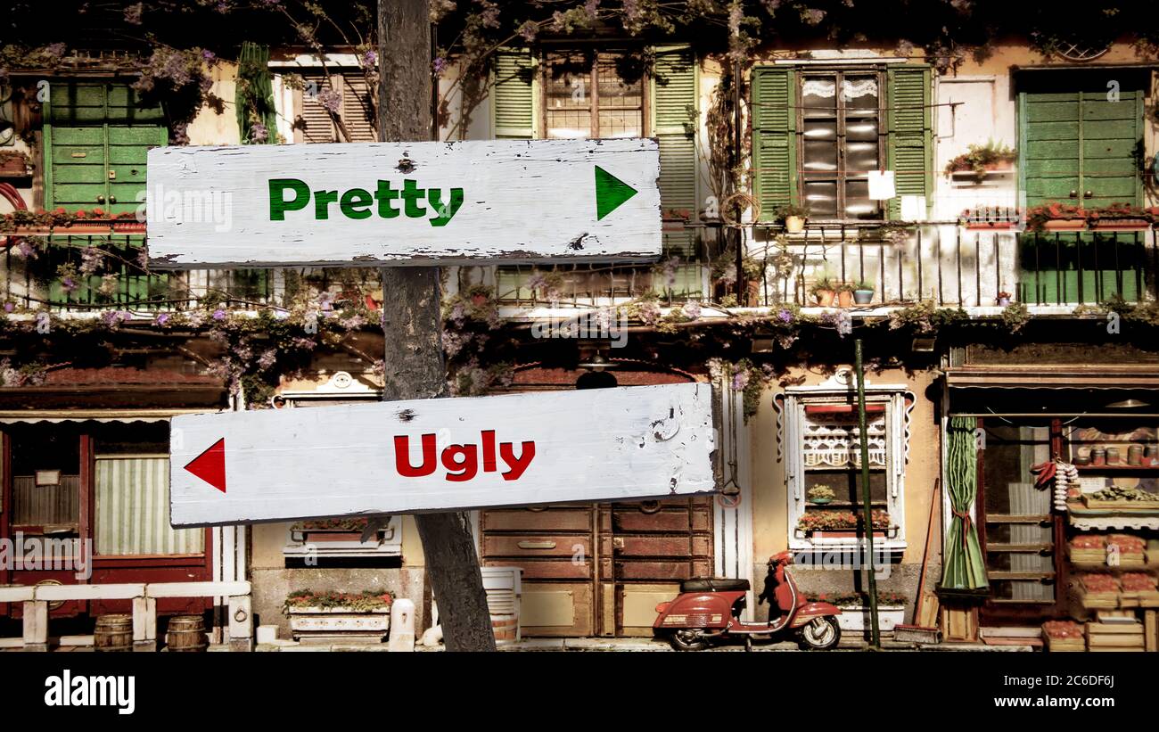 Street Sign the Direction Way to Pretty versus Ugly Stock Photo - Alamy