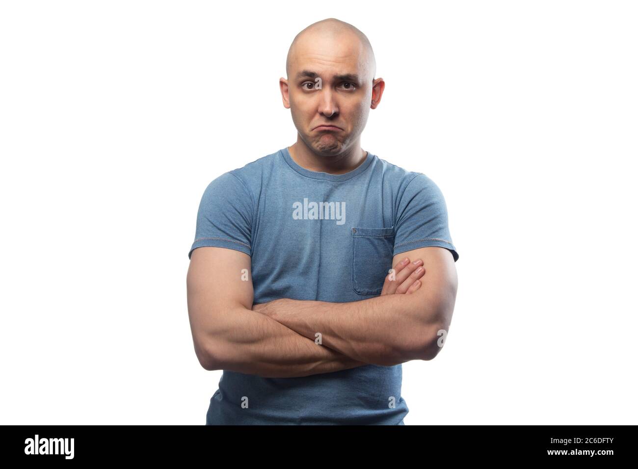 Photo of young bald sorry man in blue tee shirt Stock Photo - Alamy