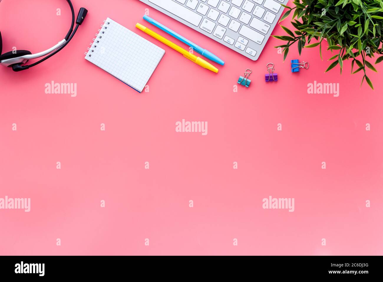 Education online school concept. Stationery, keyboard on pink table top ...