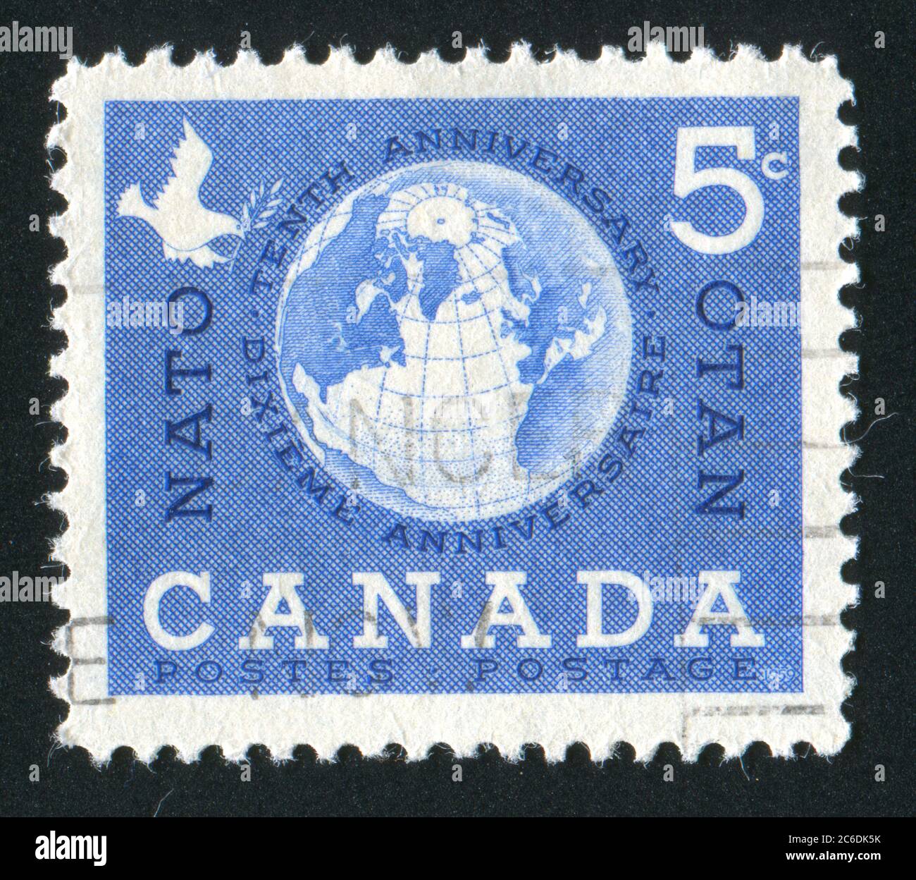 CANADA - CIRCA 1959: stamp printed by Canada, shows Globe and Dove ...