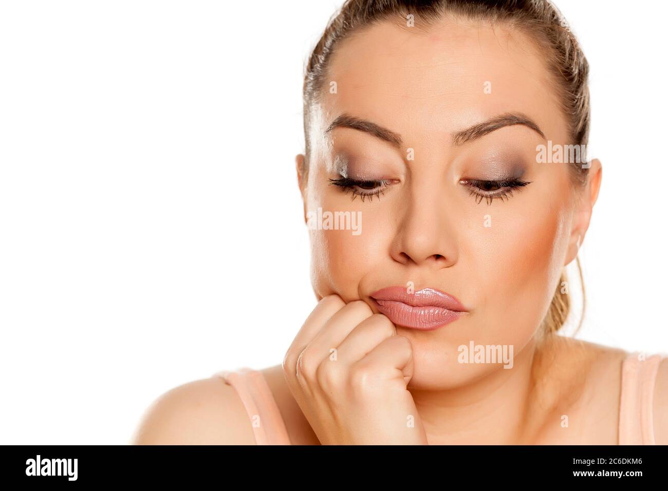 Portrait of nervous thoughtful woman on white background Stock Photo ...