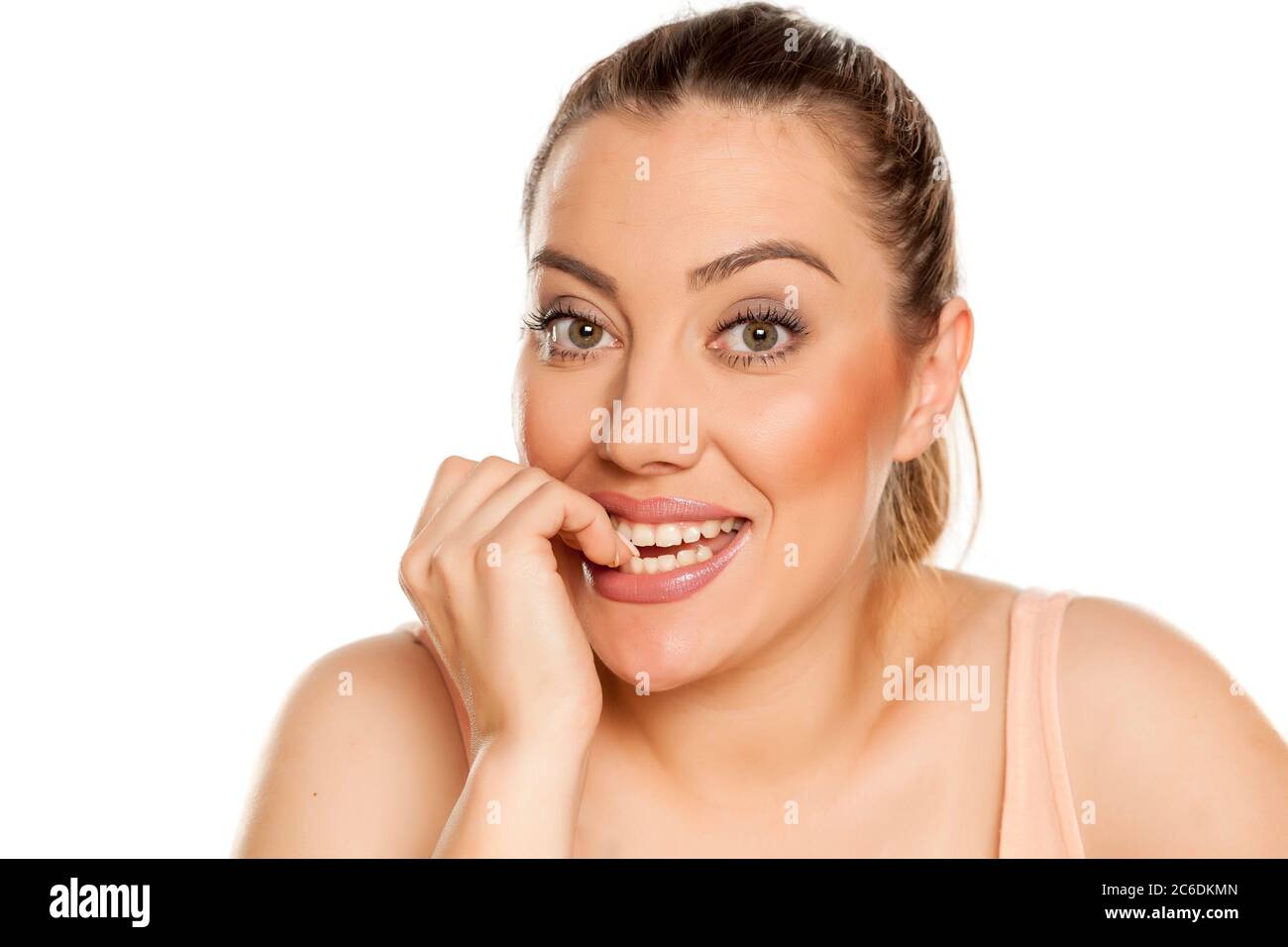 Nervous beautiful pensive girl on white background Stock Photo - Alamy