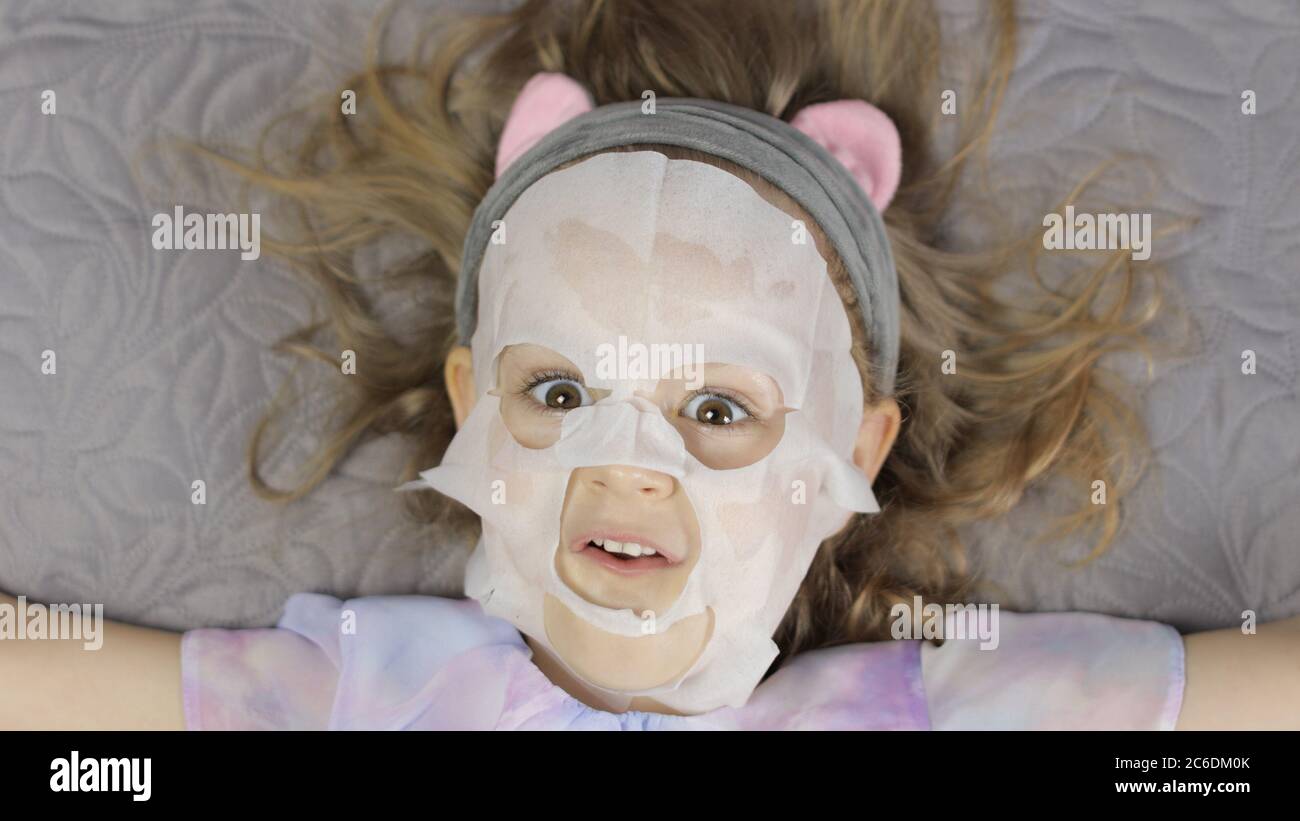 Moisturizing child hi-res stock photography and images - Alamy