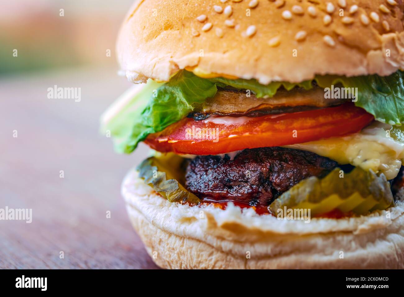 Closeup Photo of a Tasty Big Burger. Fast Food. Delicious Unhealthy ...