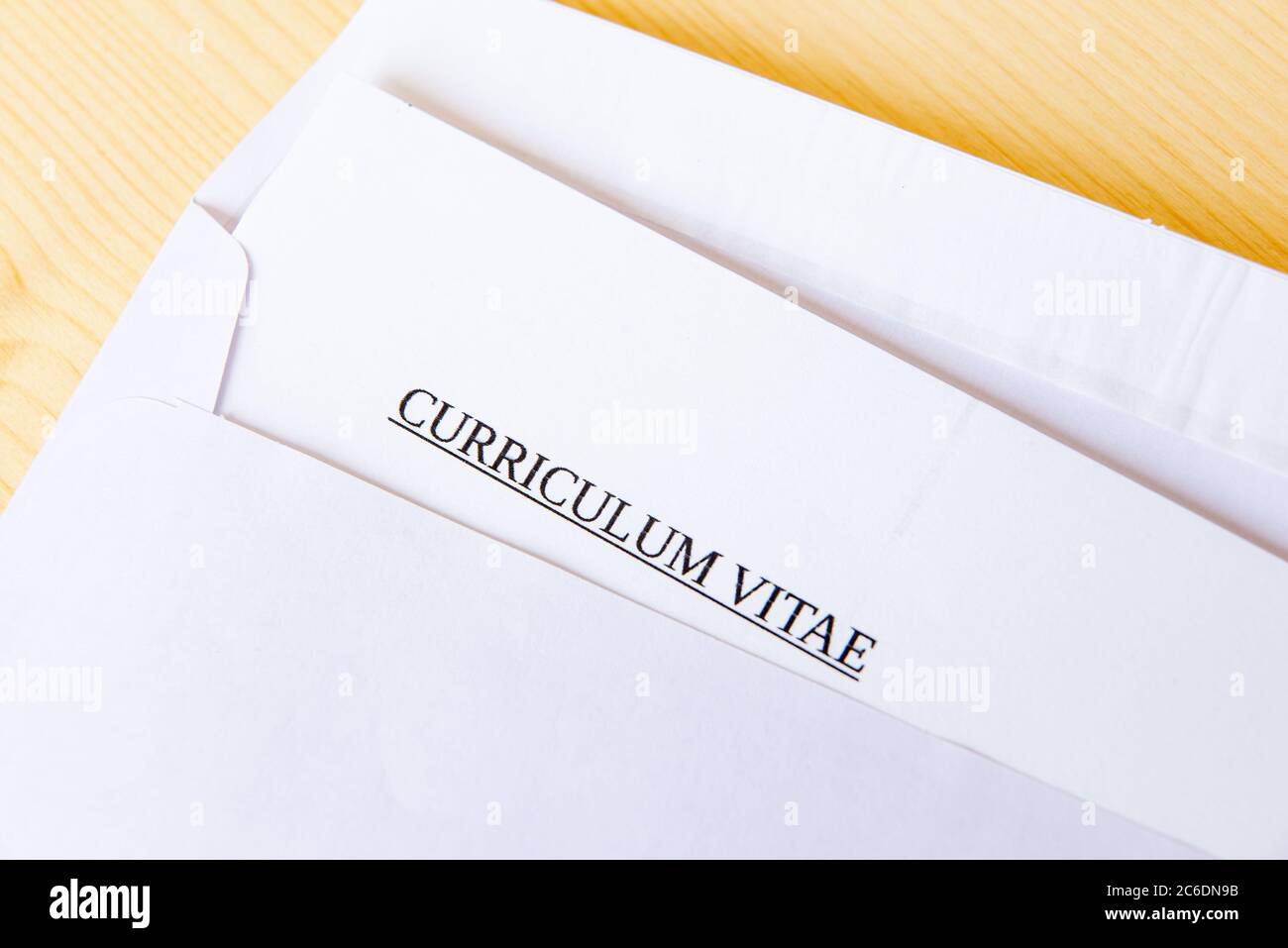 Model curriculum vitae put in an envelope Stock Photo - Alamy