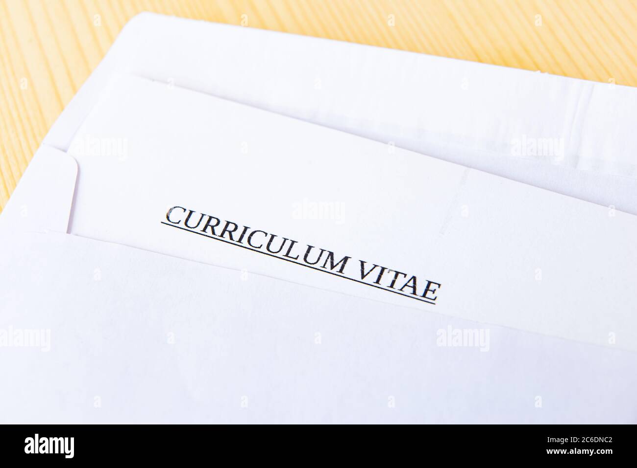 Model curriculum vitae put in an envelope Stock Photo - Alamy