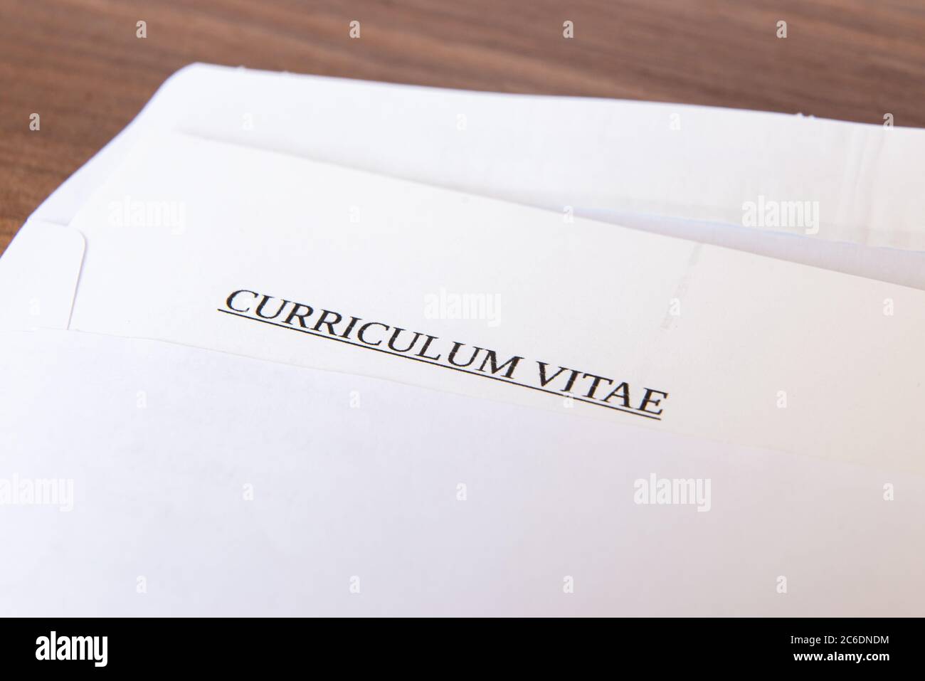 Model curriculum vitae put in an envelope Stock Photo - Alamy