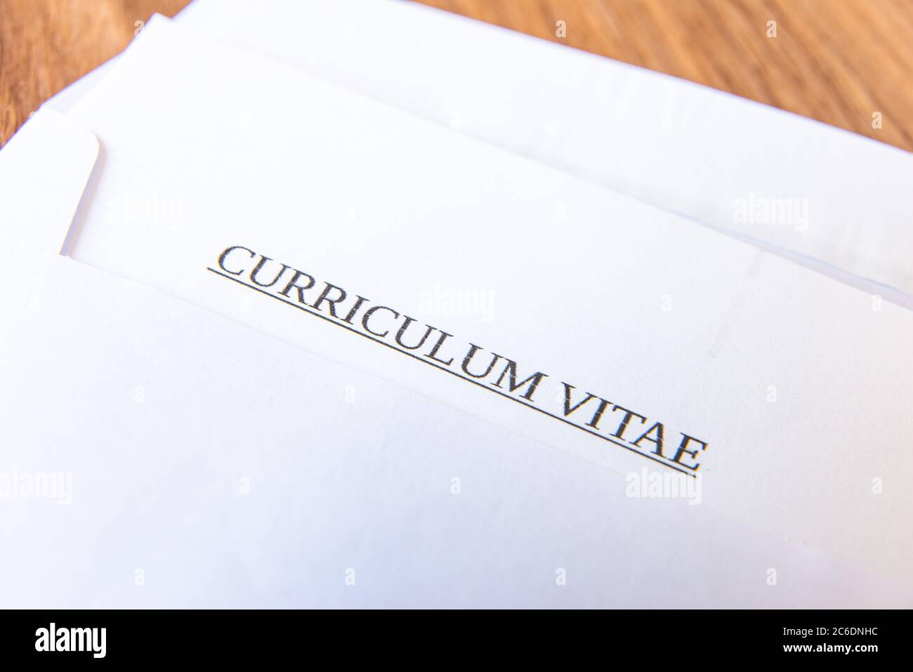 Model curriculum vitae put in an envelope Stock Photo - Alamy