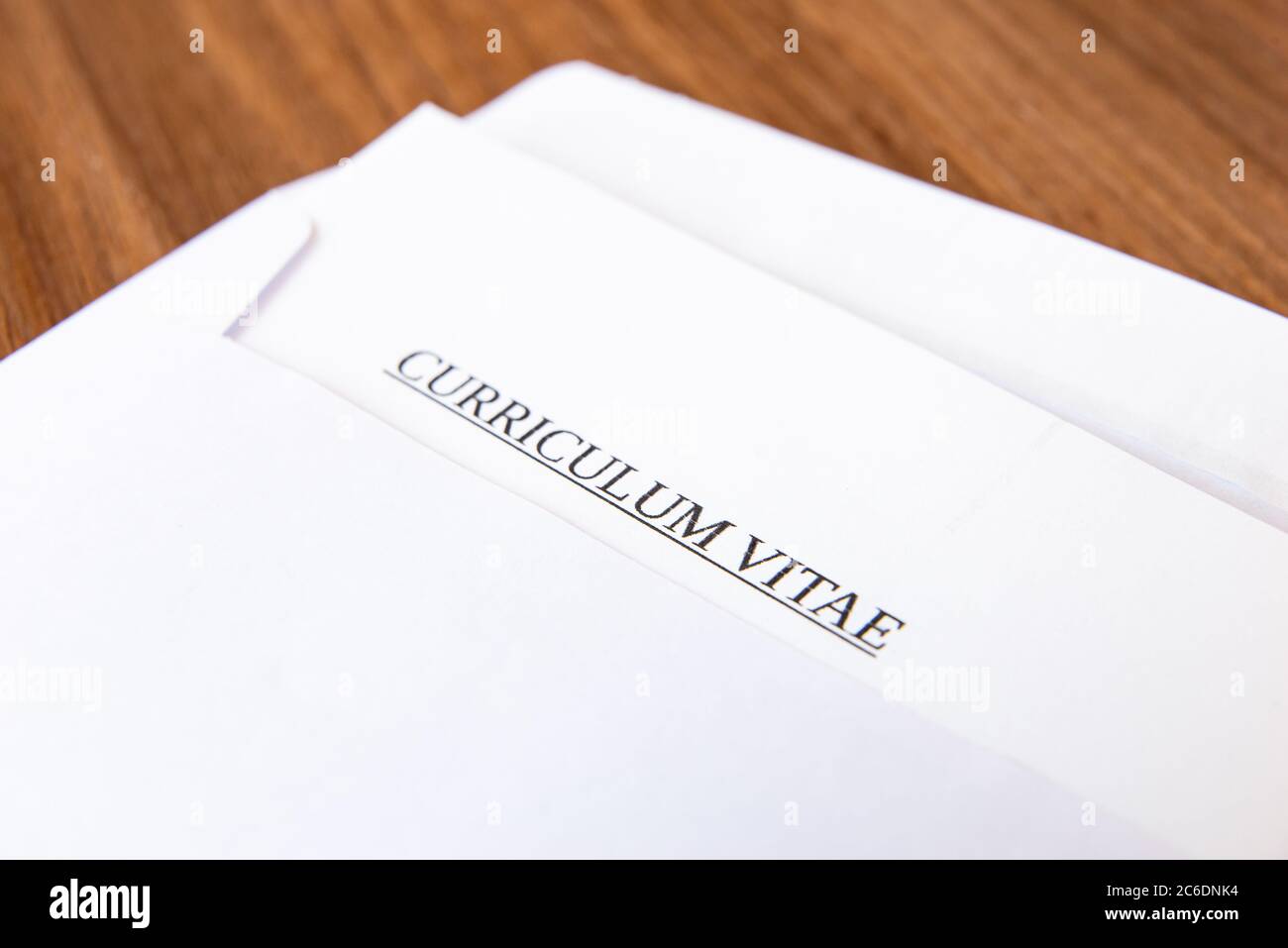 Model curriculum vitae put in an envelope Stock Photo - Alamy