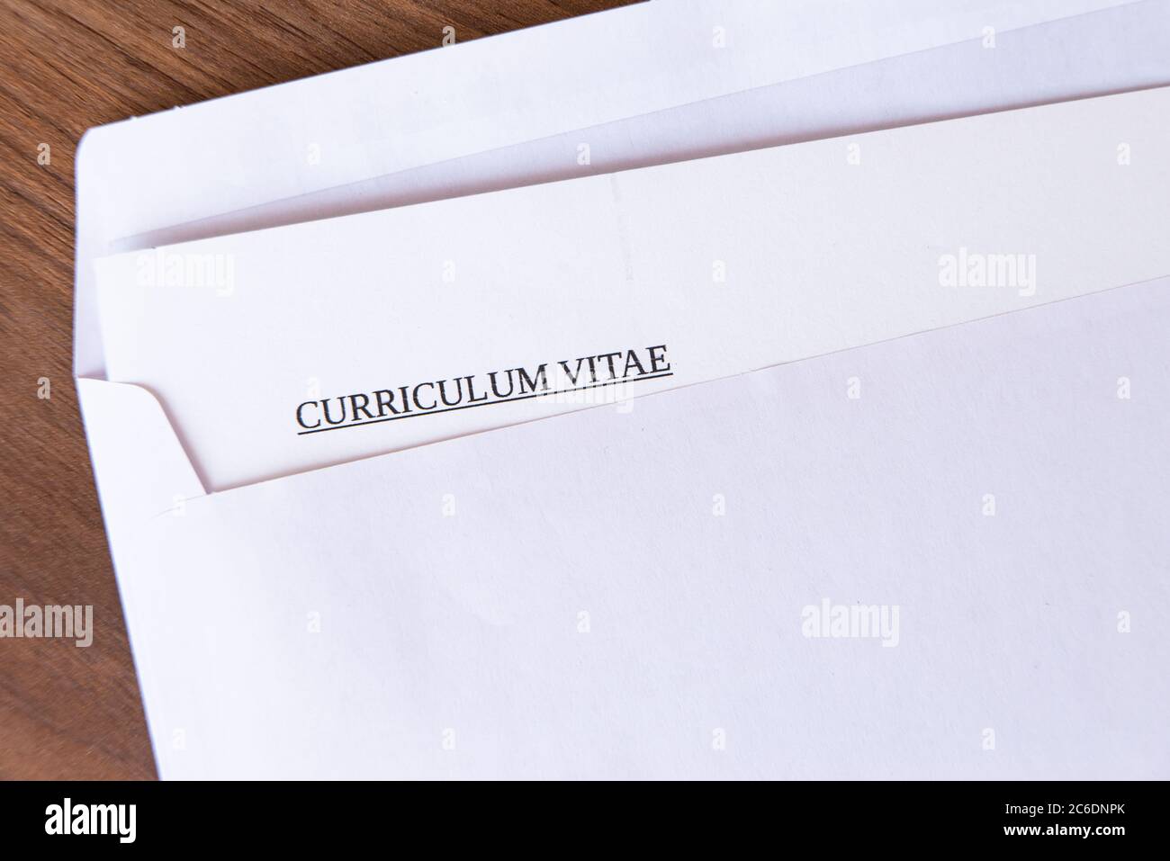 Model curriculum vitae put in an envelope Stock Photo - Alamy