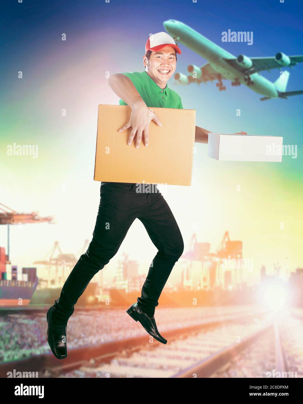 delivery man delivering carton box against logistic business background ...