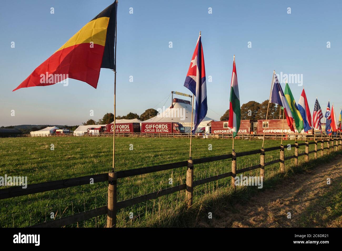 Flags of all nations line the approach to Giffords Circus at their ...