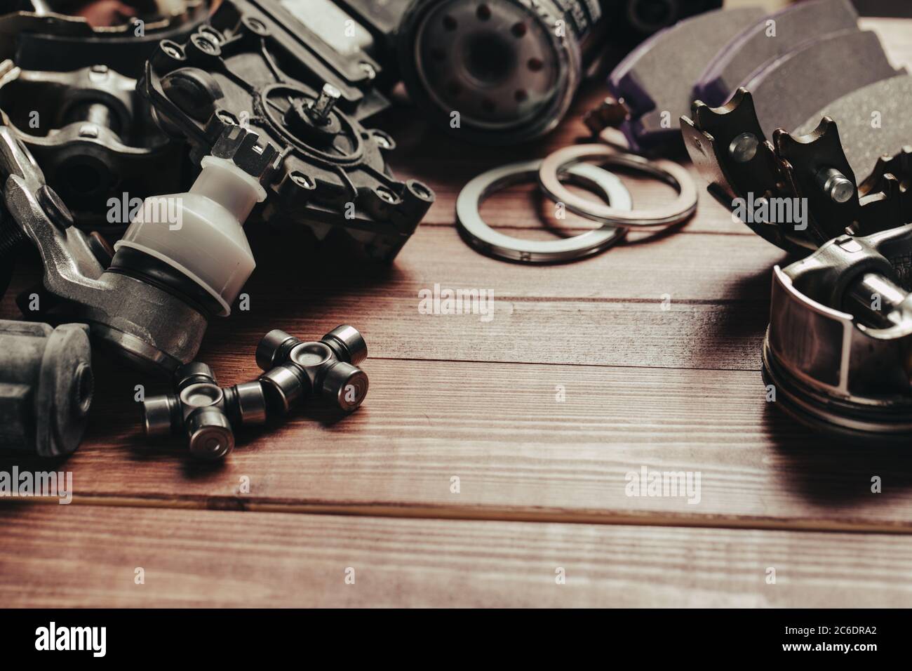 Various car parts on dark woooden background Stock Photo - Alamy