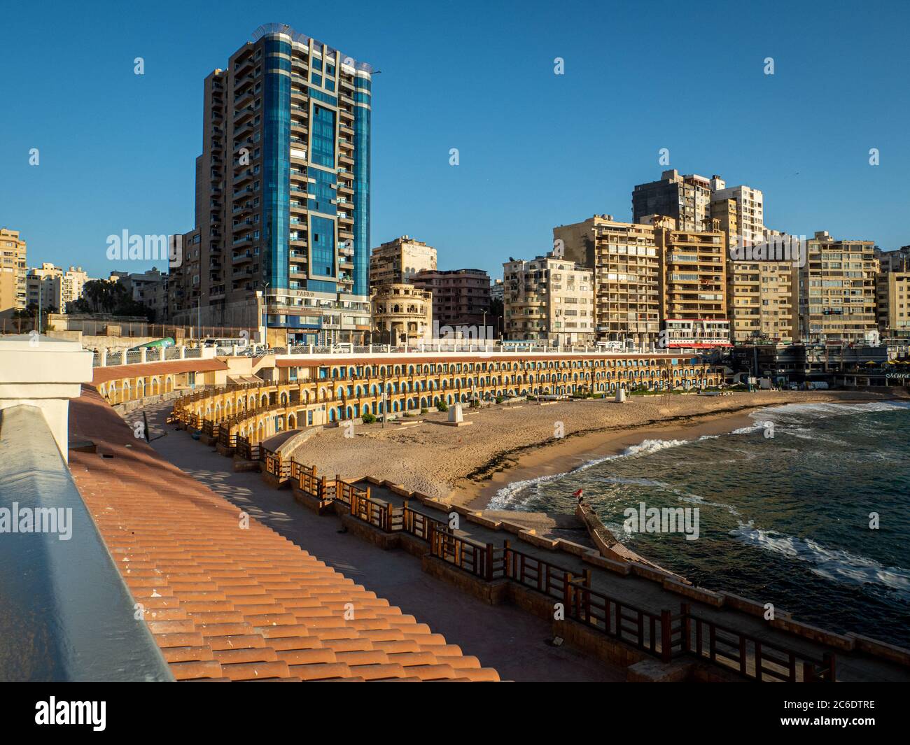 the most famous beach in Alexandria at golden hour - Stanley Beach with ...