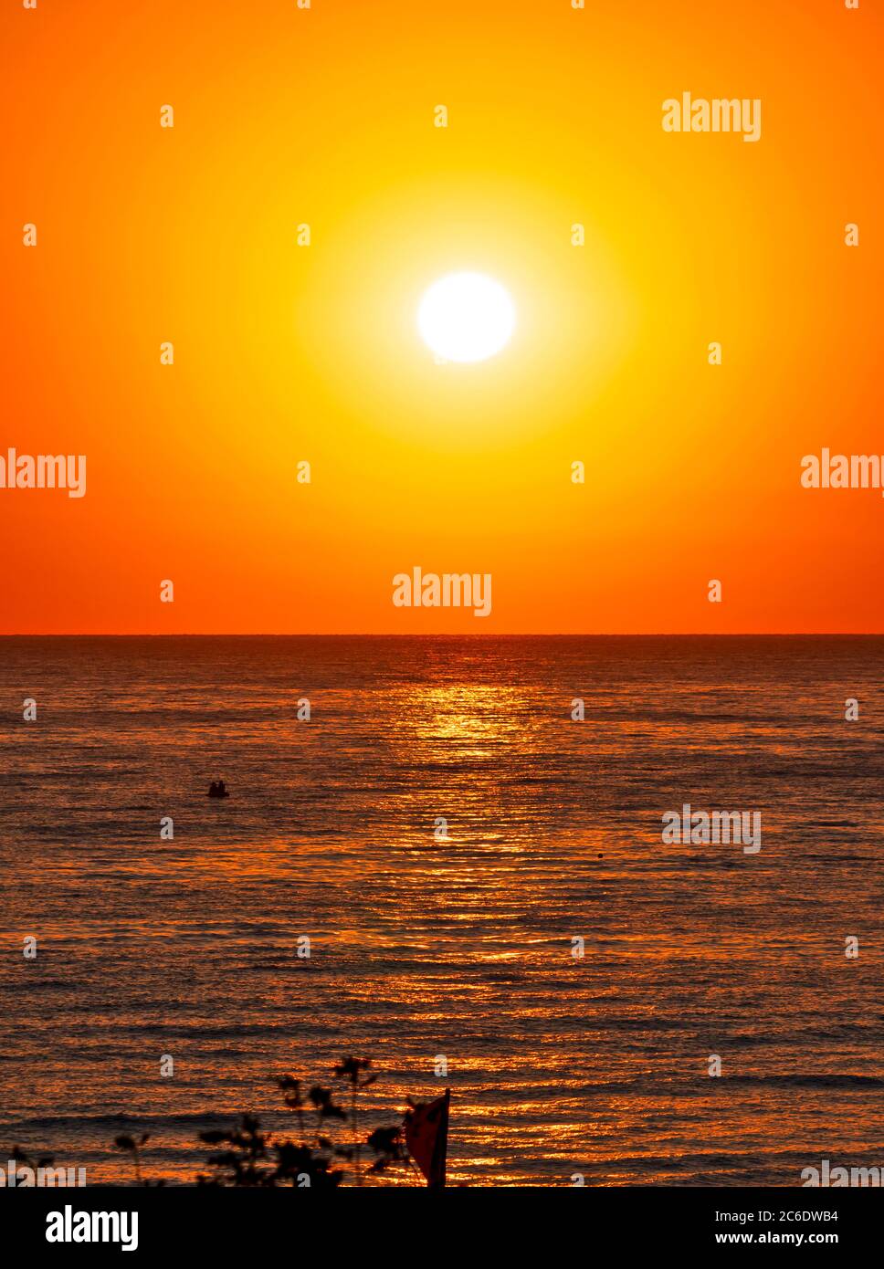 Sun down over sea hi-res stock photography and images - Alamy