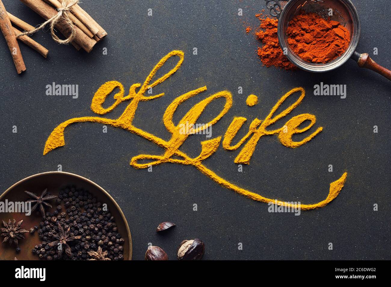 Spice of Life - 'Of Life' in calligraphy created from turmeric on a ...