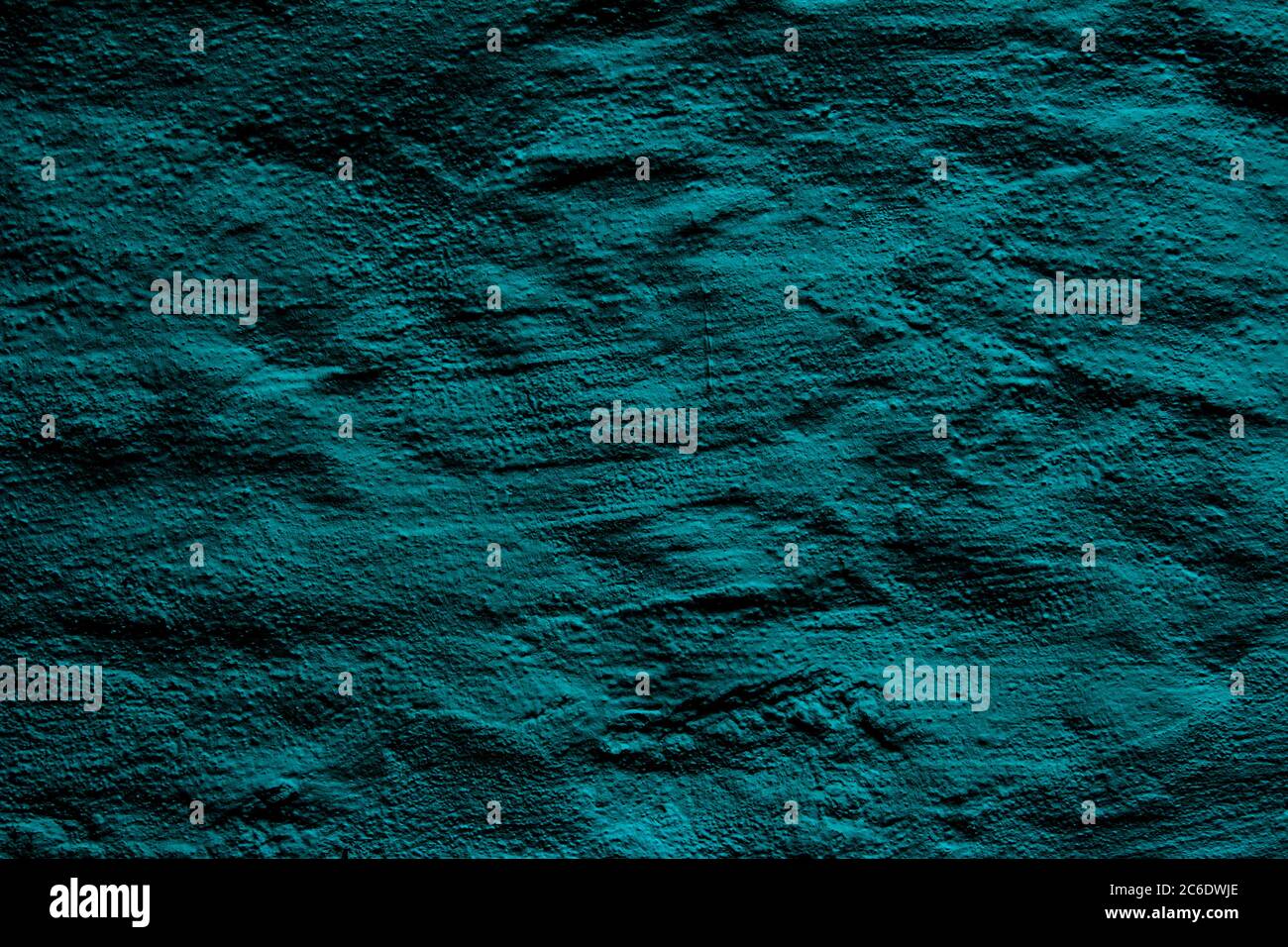 Petrol colored wall texture background with textures of different ...