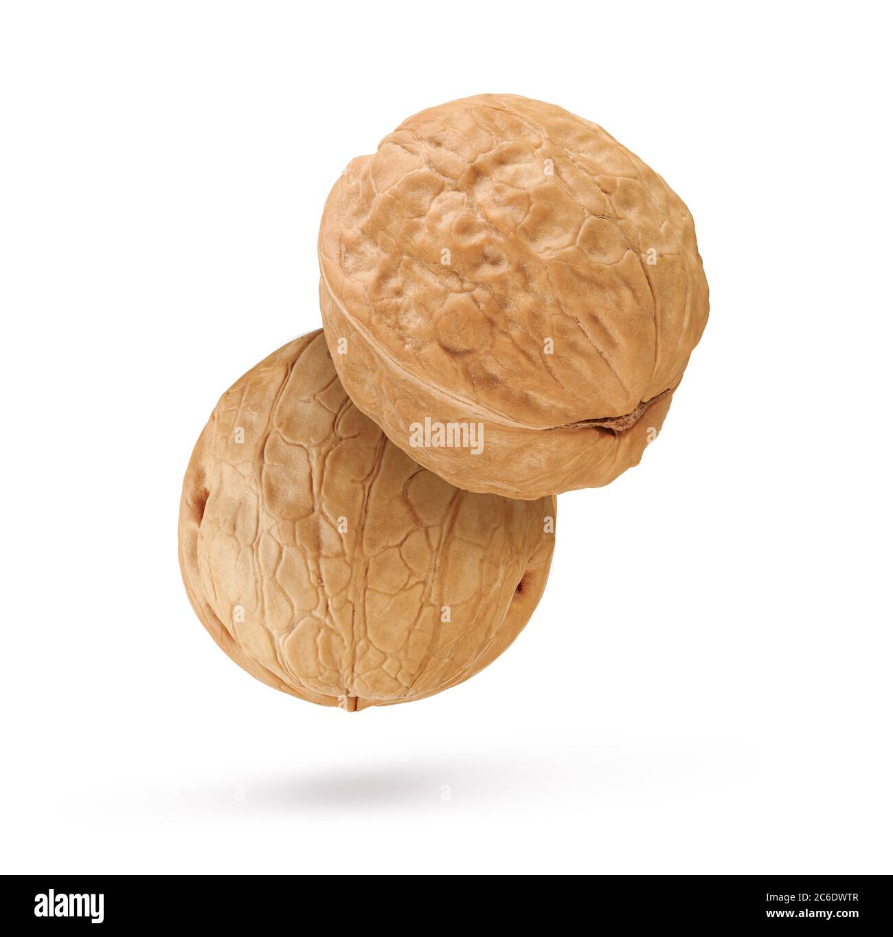 Whole walnuts isolated on white background Stock Photo - Alamy