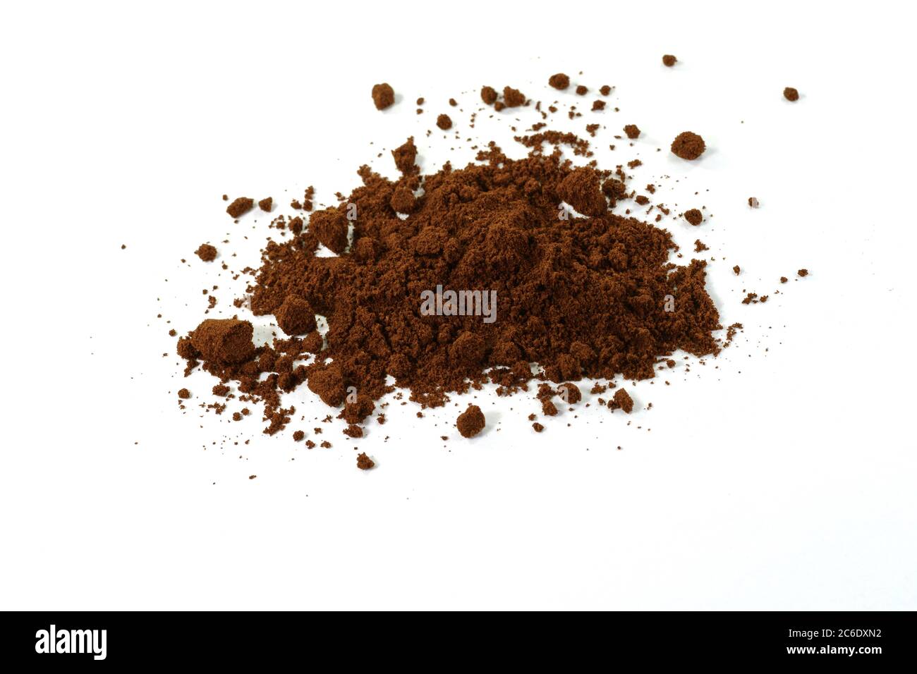 Pile of fresh ground coffee powder isolated on white Stock Photo - Alamy