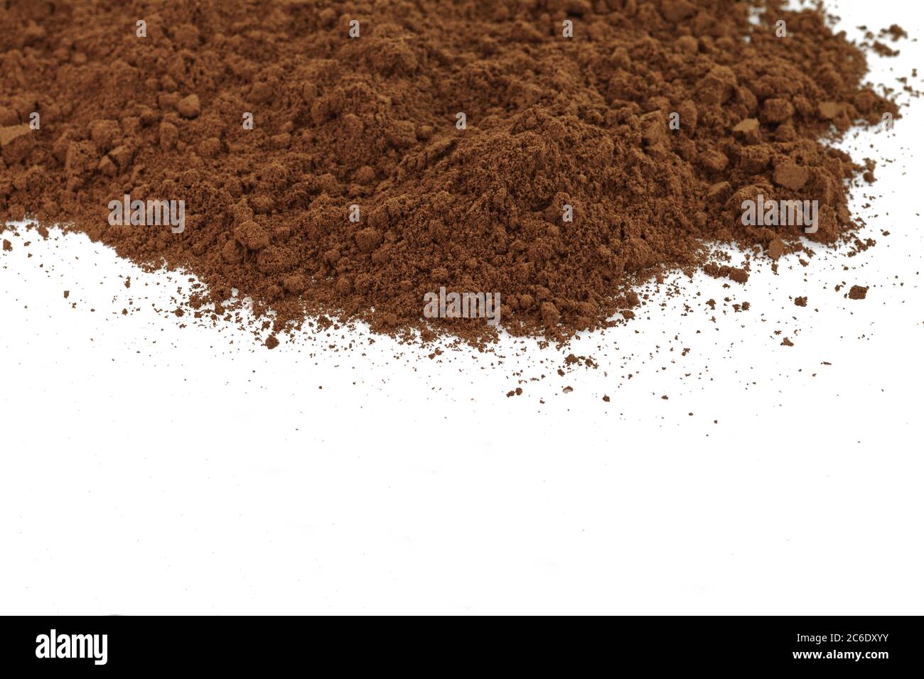 Pile of fresh ground coffee powder isolated on white Stock Photo - Alamy