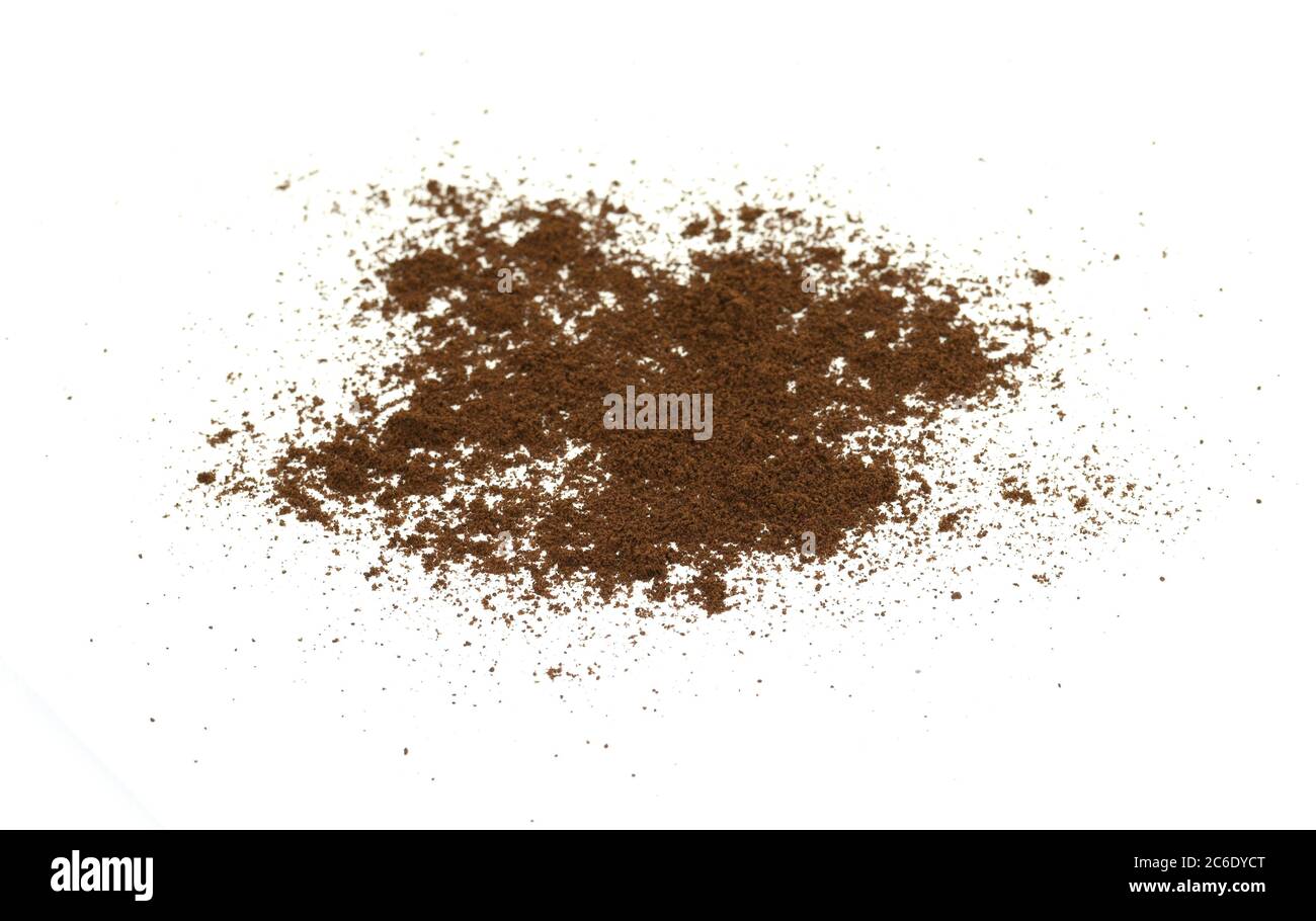 Pile of fresh ground coffee powder isolated on white Stock Photo - Alamy
