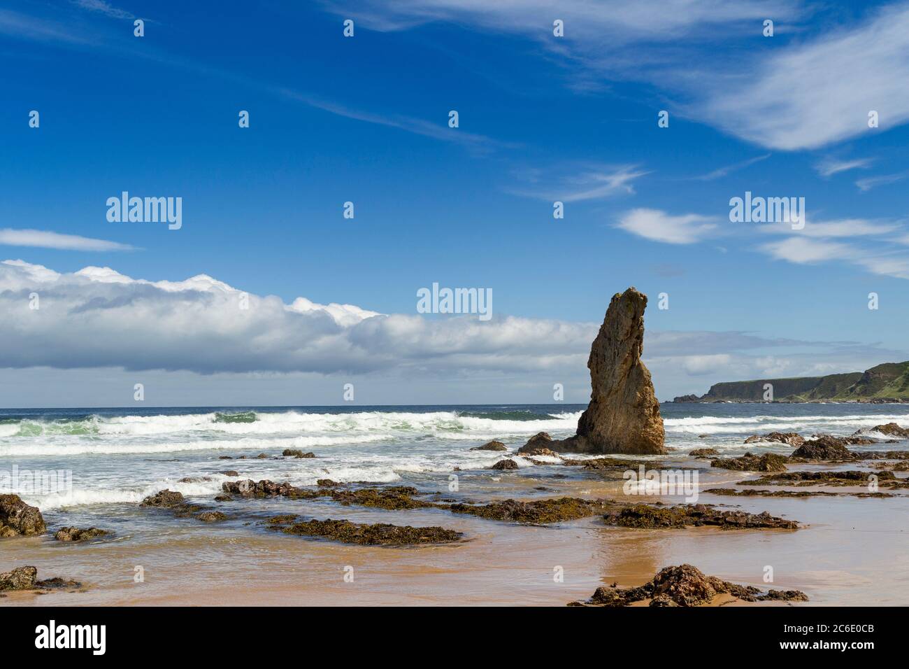 CULLEN BAY BEACH AND TOWN MORAY COAST SCOTLAND A BLUE SKY AND A SANDY ...