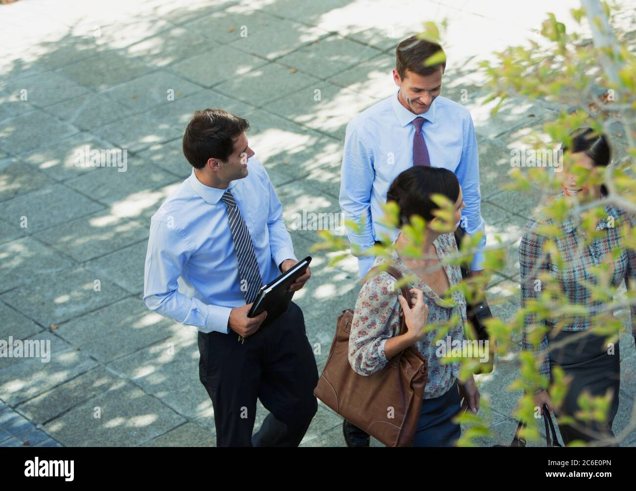 Business people talking outdoors Stock Photo - Alamy