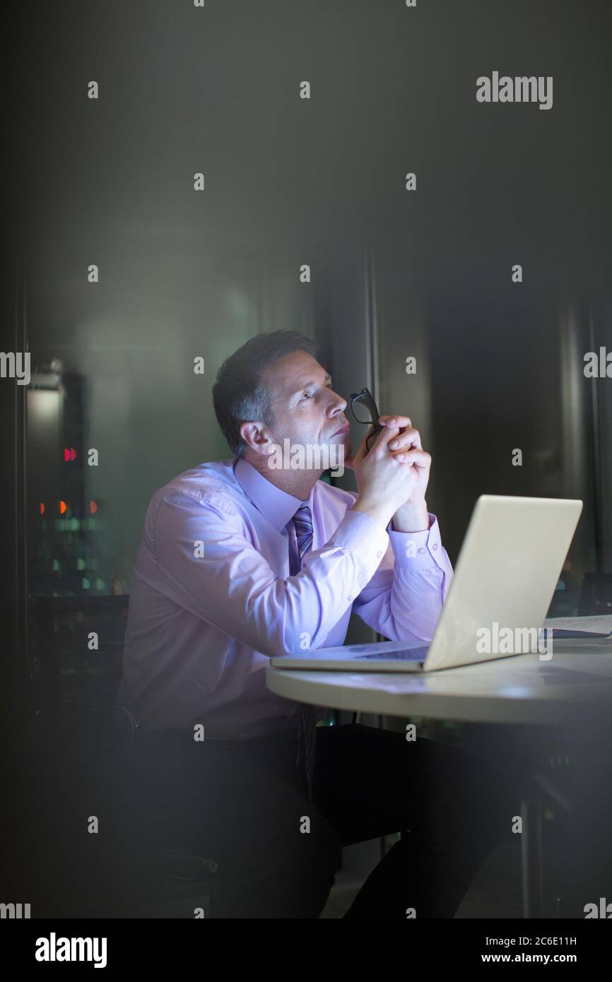 Pensive businessman laptop hi-res stock photography and images - Alamy