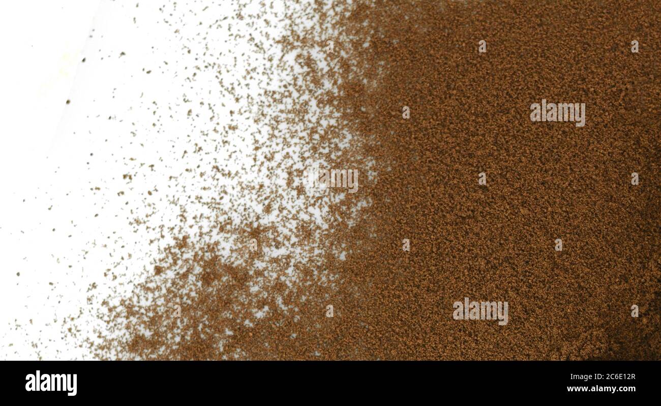 Pile of fresh ground coffee powder isolated on white Stock Photo - Alamy