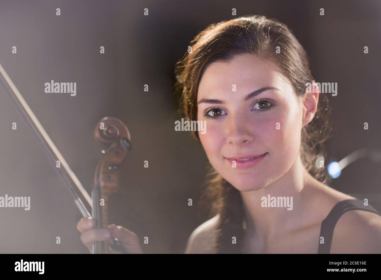 Portrait of smiling violinist Stock Photo - Alamy
