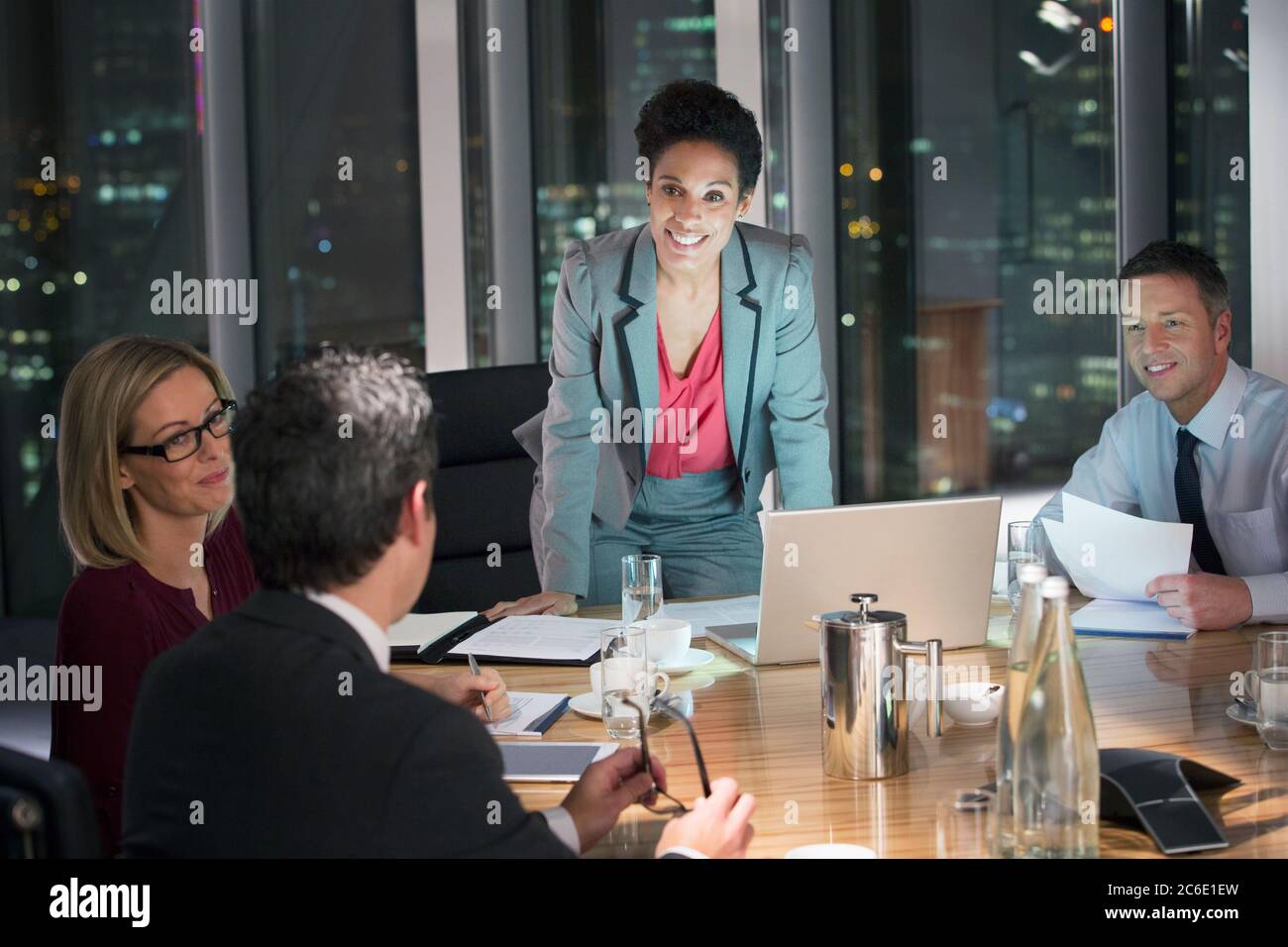 Business people meeting in conference room at night Stock Photo - Alamy