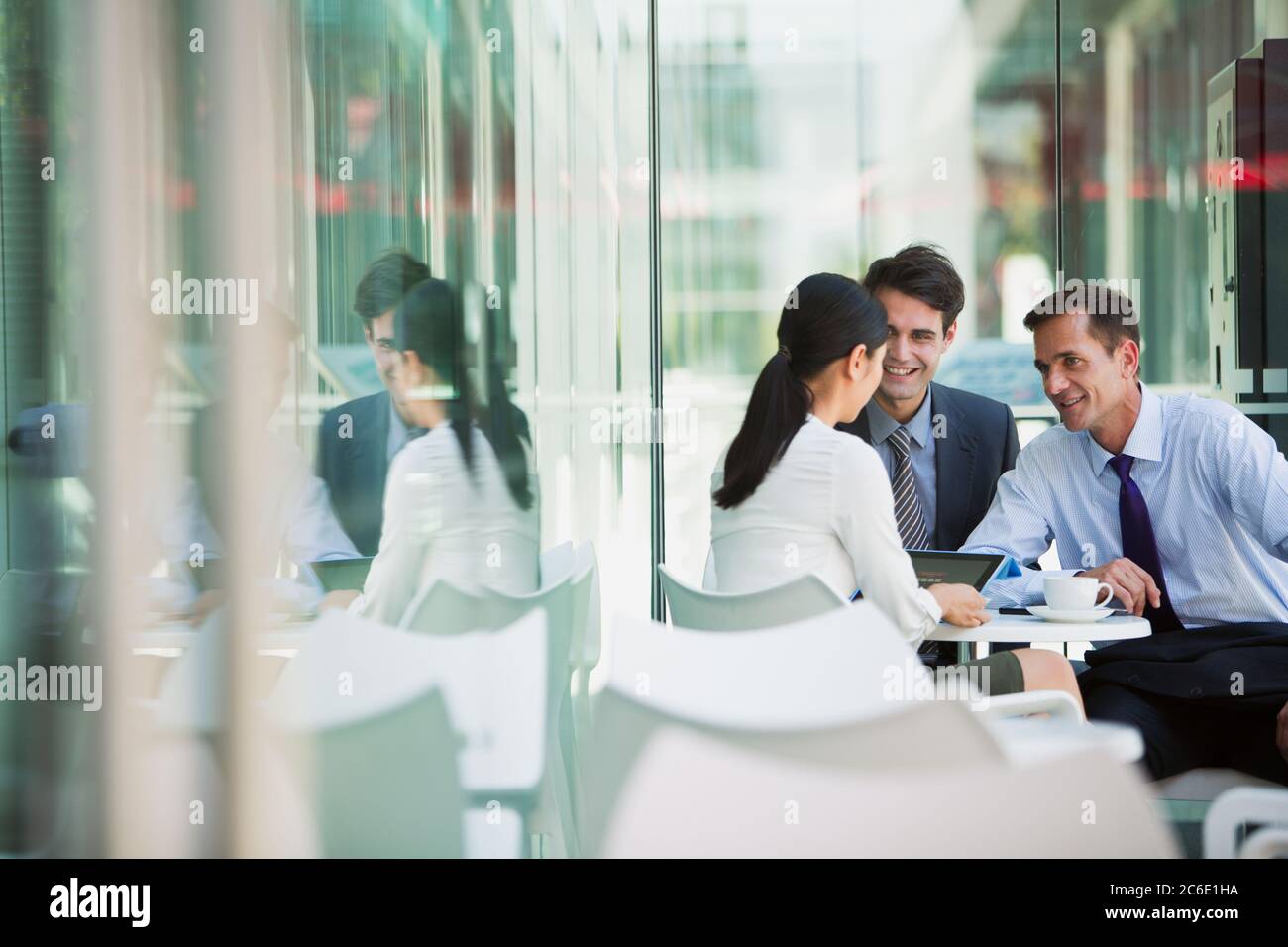 Business people working at cafe Stock Photo - Alamy