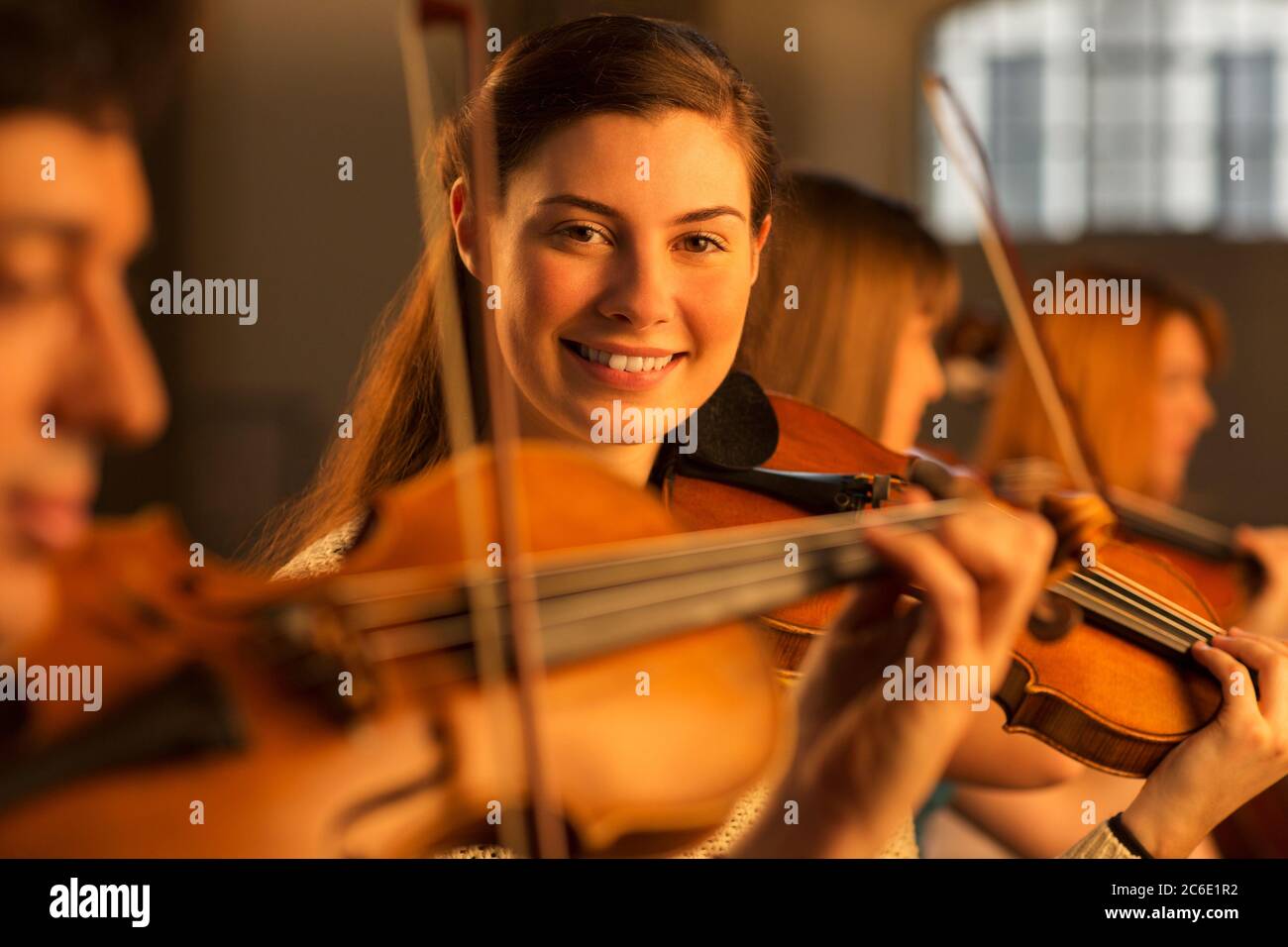 Portrait of smiling violinist Stock Photo - Alamy