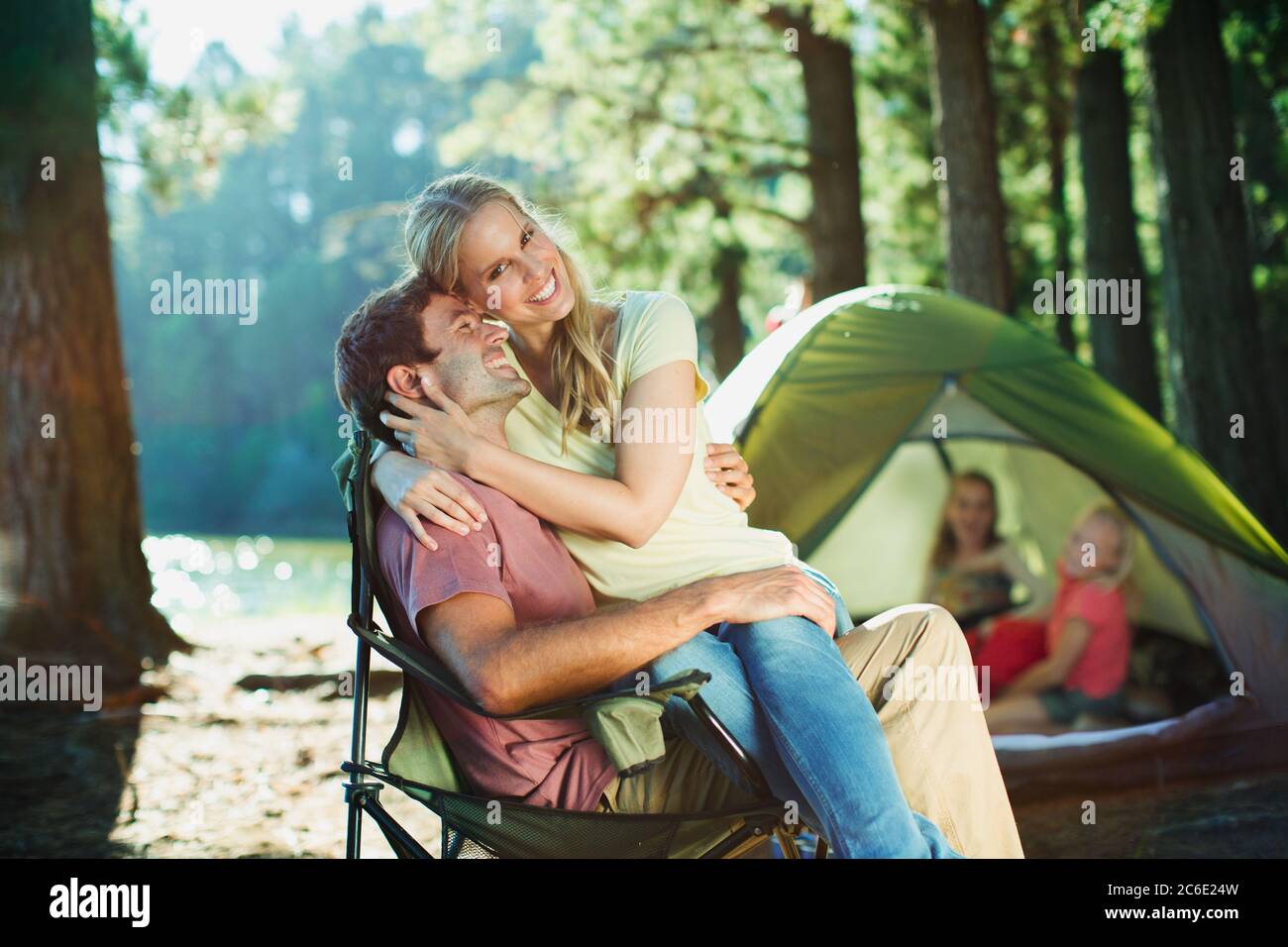 Woman sitting on man lap hi-res stock photography and images - Alamy