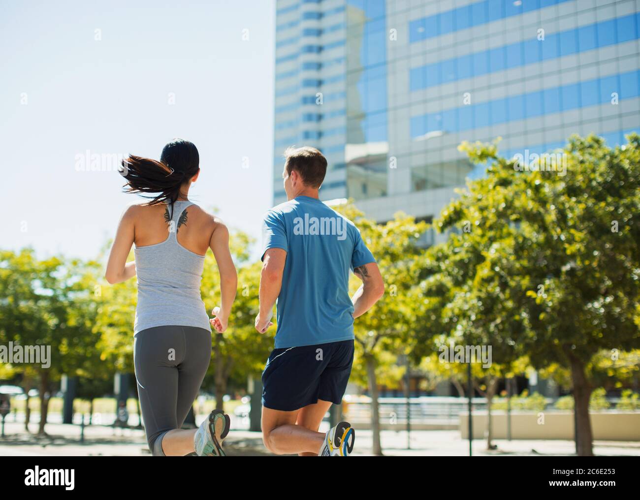 Two young women jog on hi-res stock photography and images - Alamy