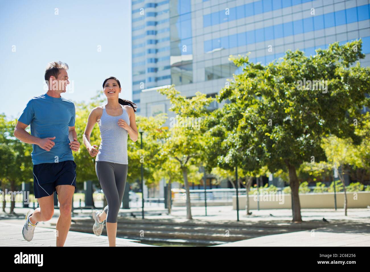 Two young women jog on hi-res stock photography and images - Alamy