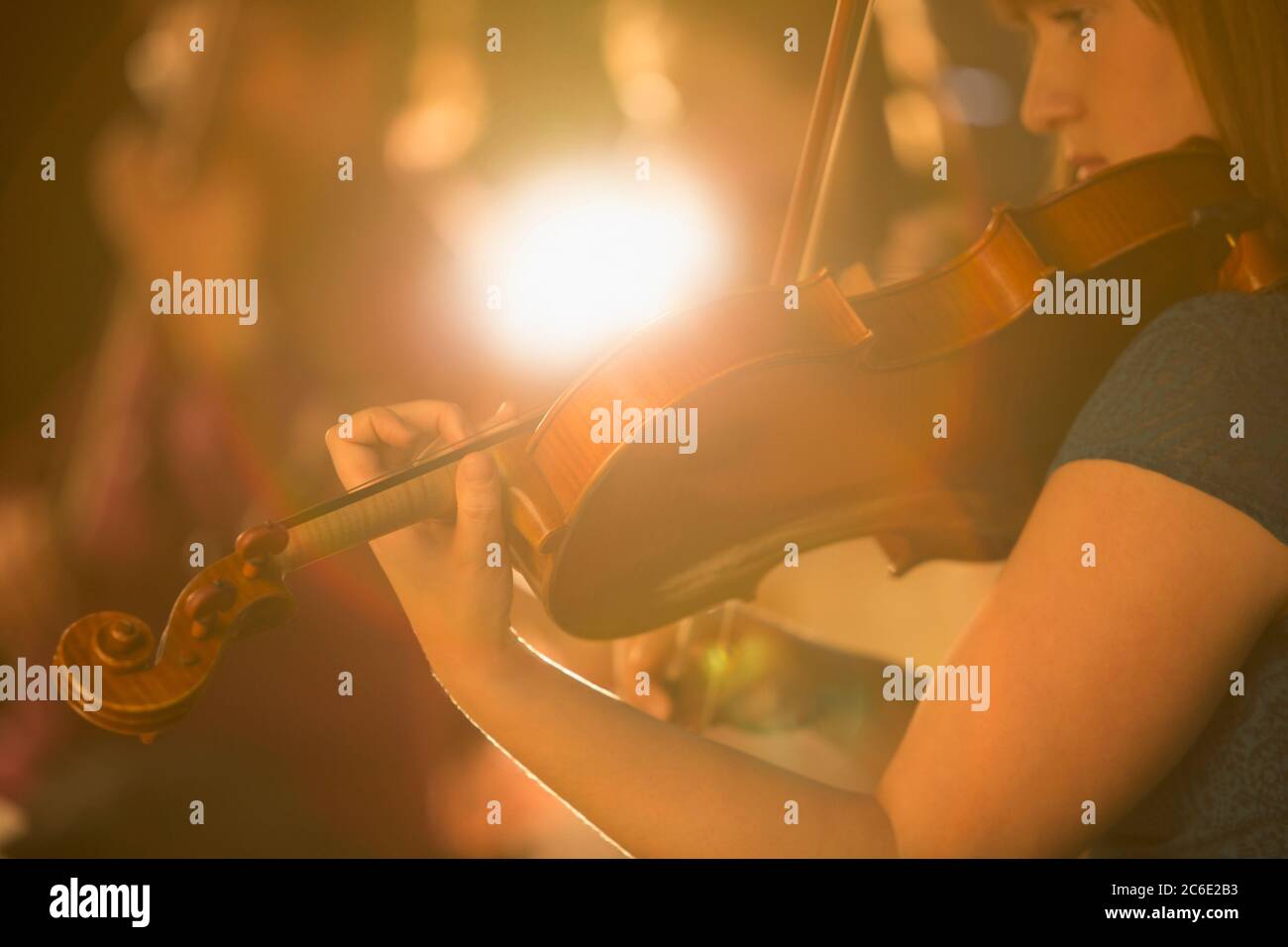 Close up young woman playing violin hi-res stock photography and images ...