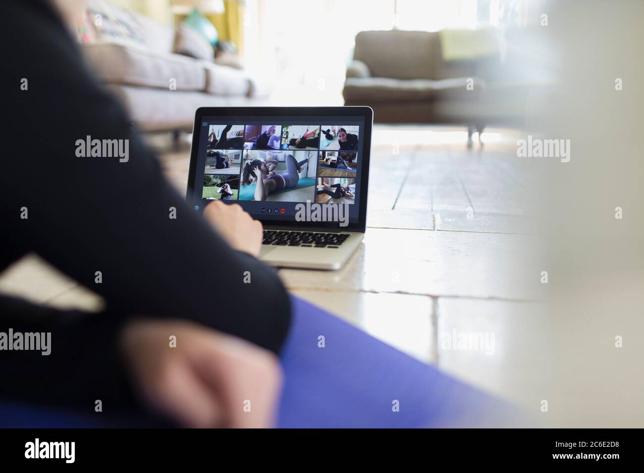 Online exercise class on laptop screen Stock Photo - Alamy