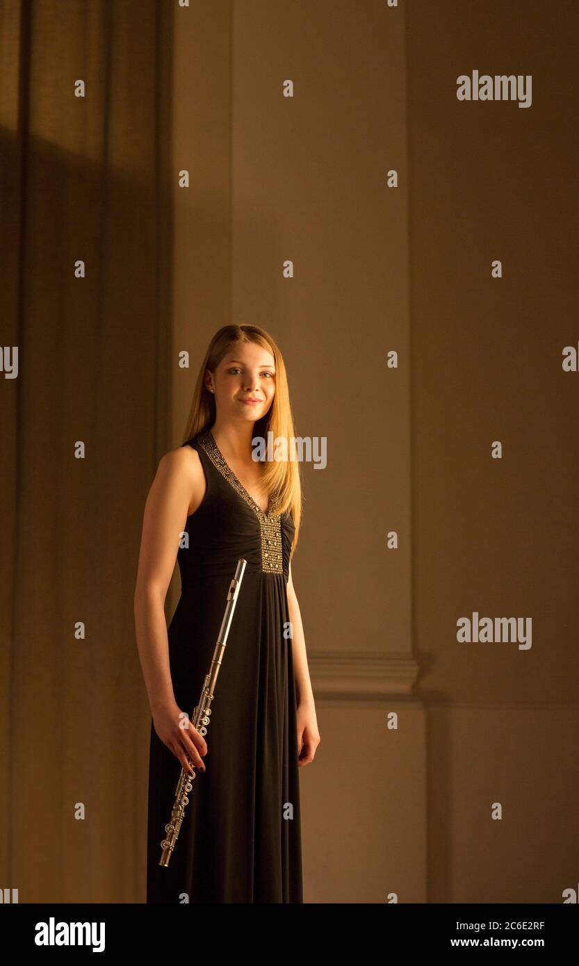 Portrait smiling flutist hi-res stock photography and images - Alamy
