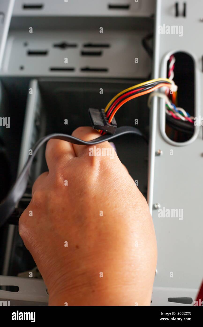 Inside Tech concept - a close-up view of a hand reaching into the ...