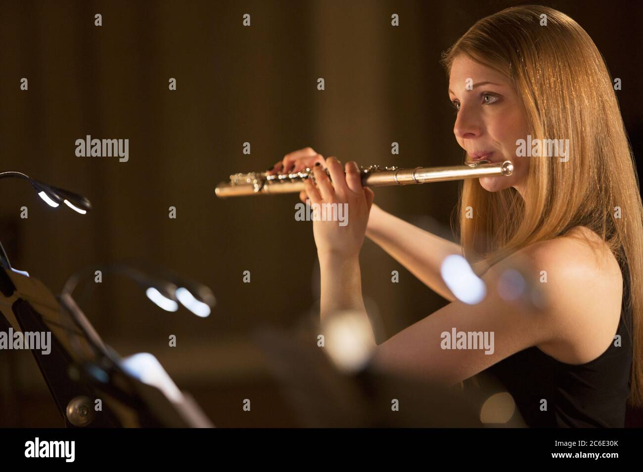 Flutist sitting hi-res stock photography and images - Alamy