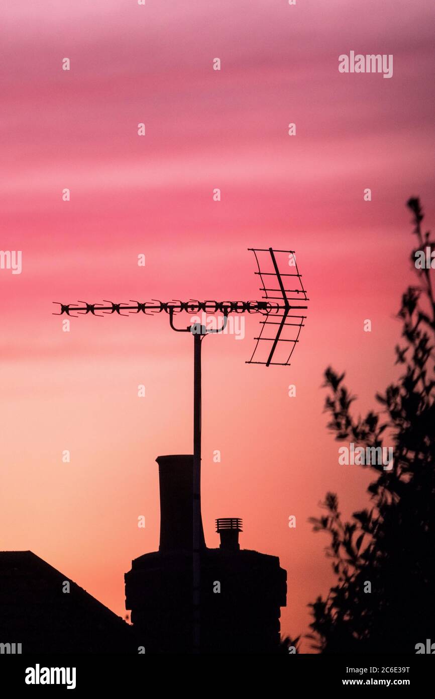 Television tv aerial transmitter receiver during sunset Stock Photo - Alamy