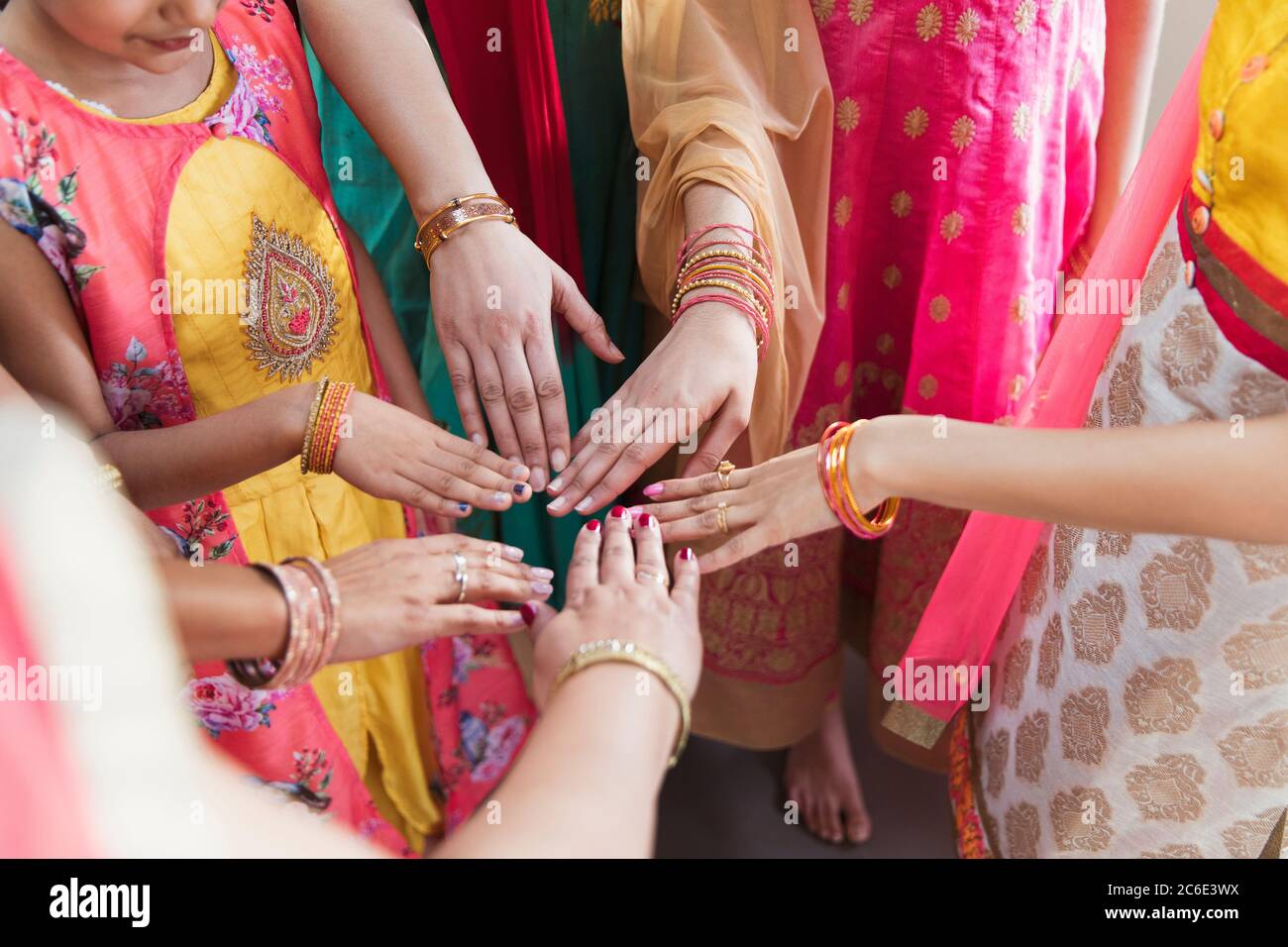 Woman joining hands hi-res stock photography and images - Alamy