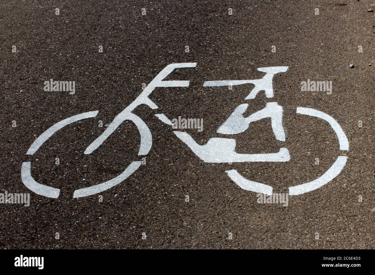 Bicycle lane symbol painted on a road Stock Photo - Alamy