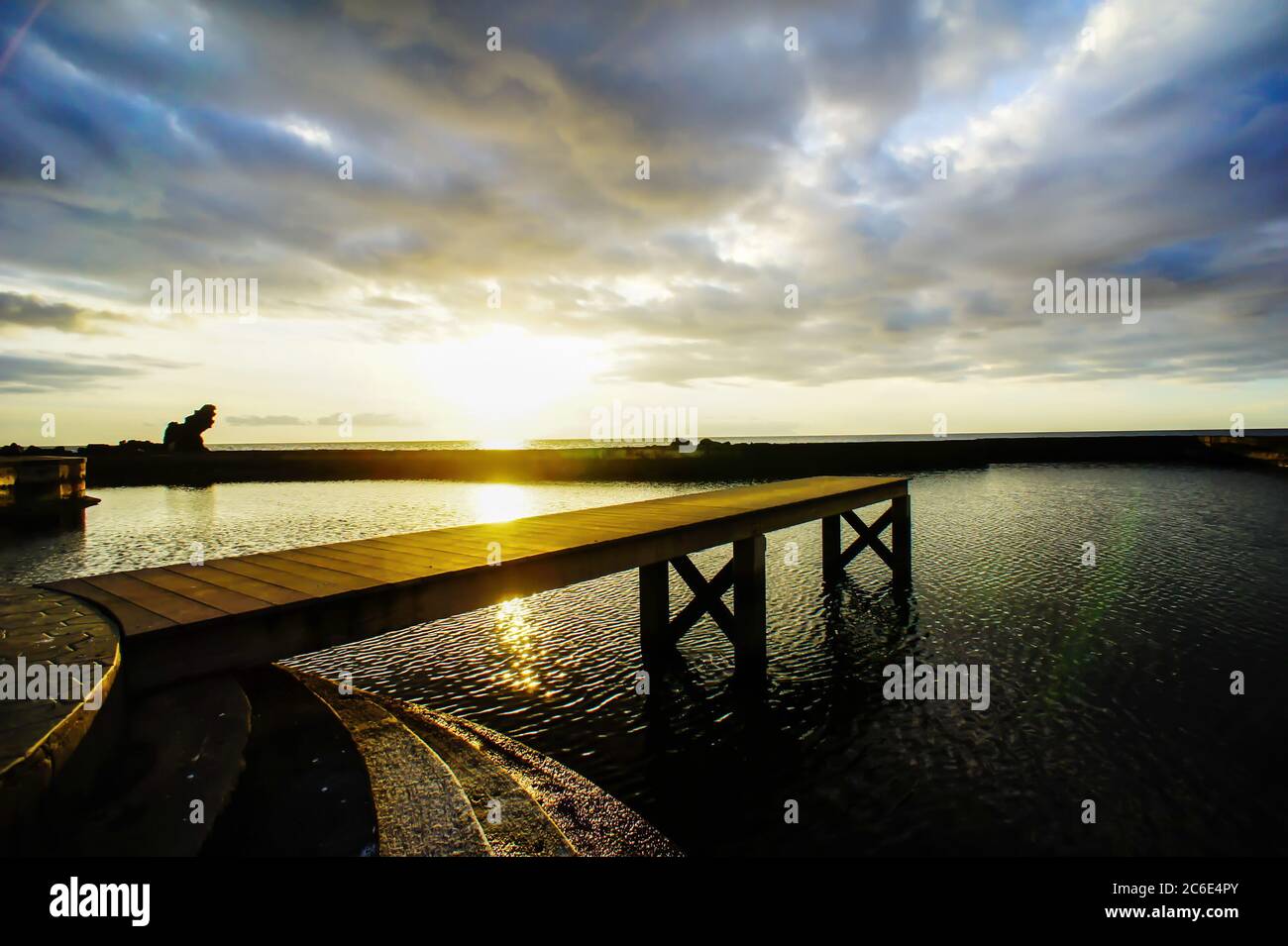 Sunrise on a Pier over Atlantic Ocean in Tenerife Canary Islands Spain ...