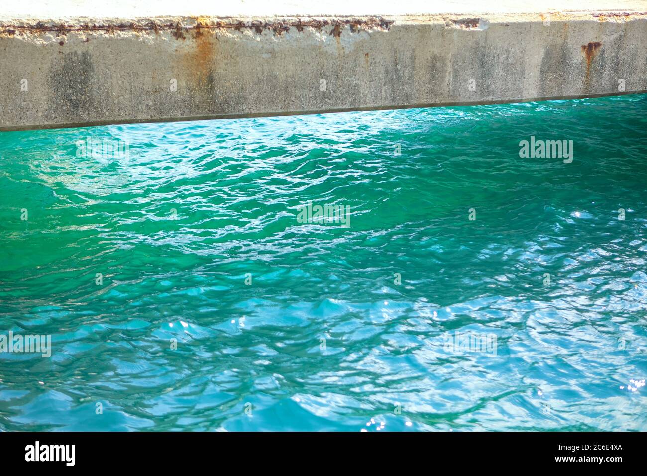 Concrete beam bridge over water . Turquoise Colored Sea Water Stock ...
