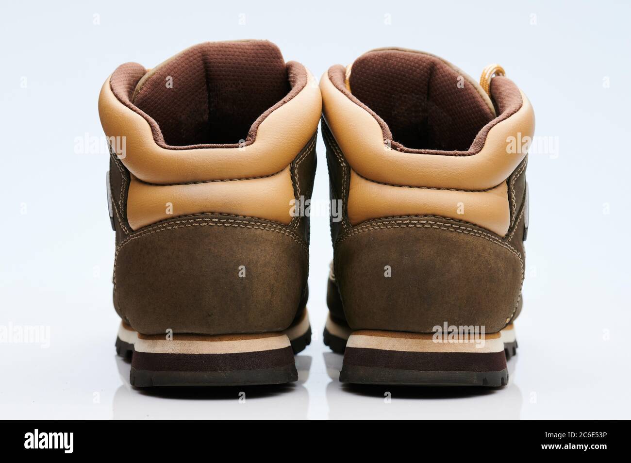 Pair of brown trail boots back view isolated on white background Stock ...