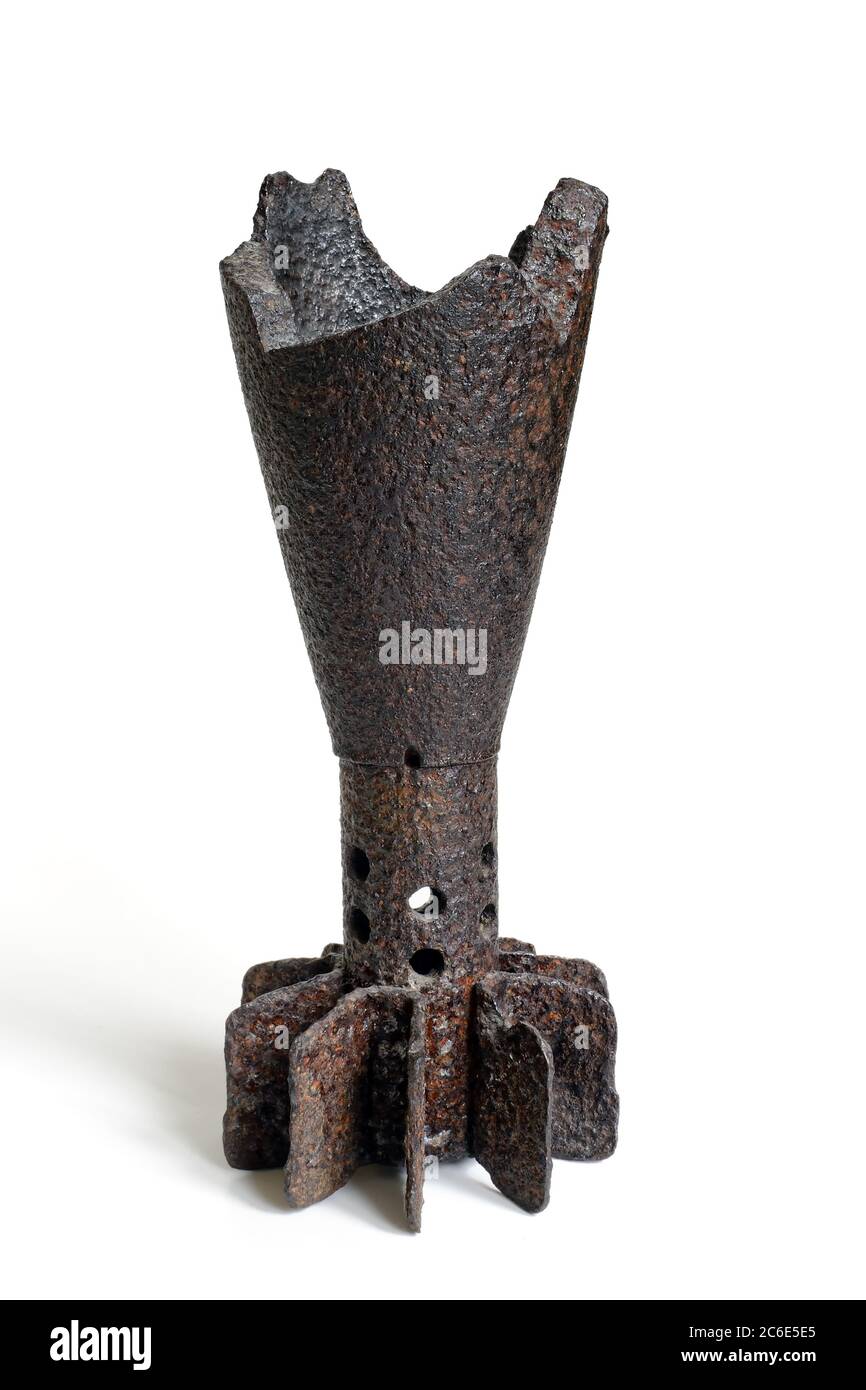 Old rusted World War II splinter of mortar shell on white background ...